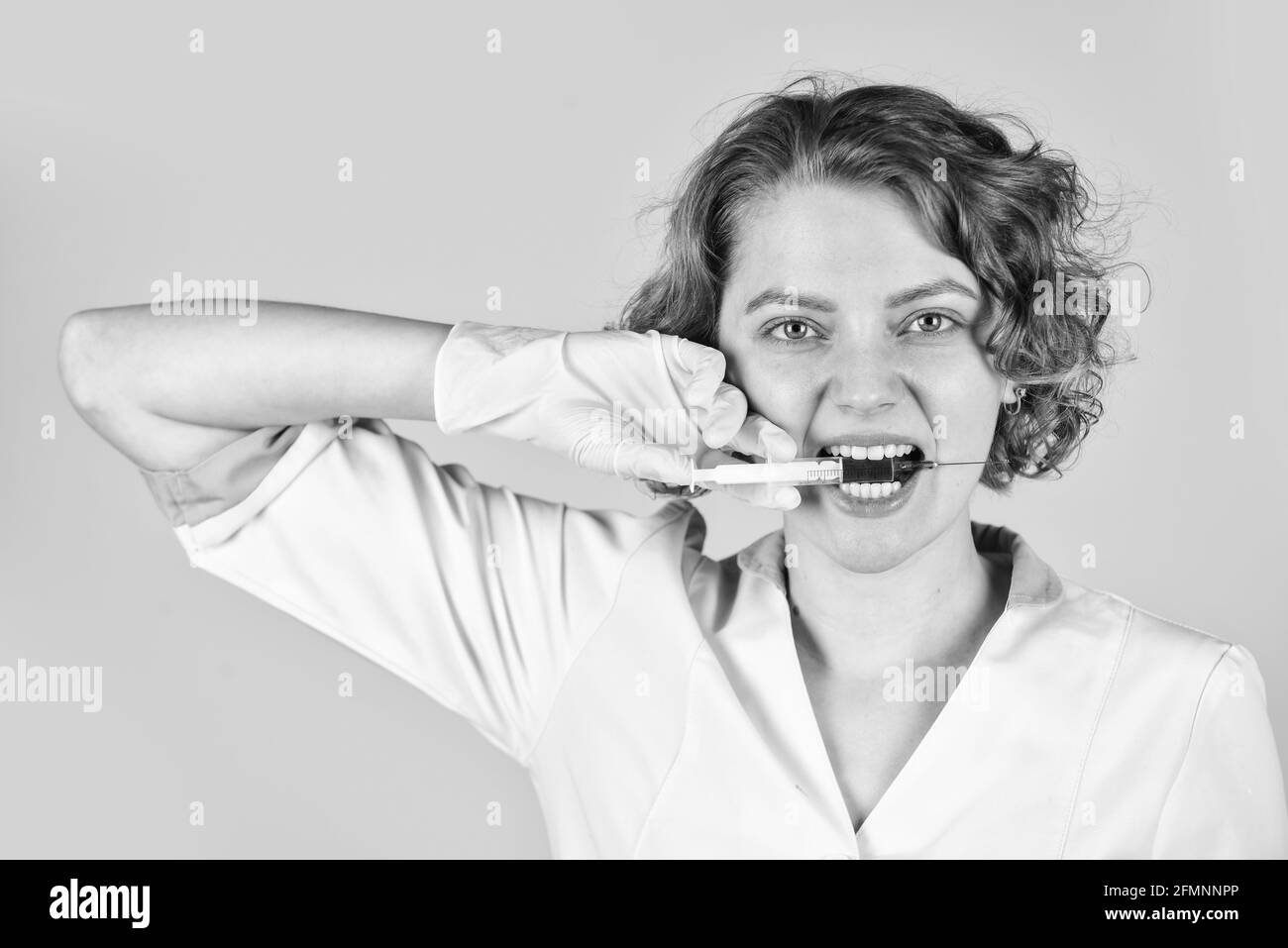 Anesthesia and painkillers. Vaccination syringe needle. Hospital staff ...