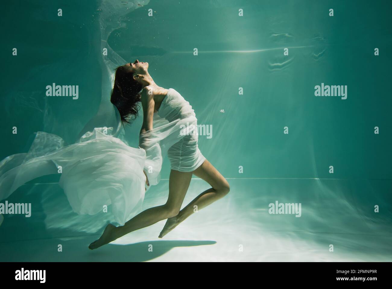 Woman water wet clothes hi-res stock photography and images - Alamy