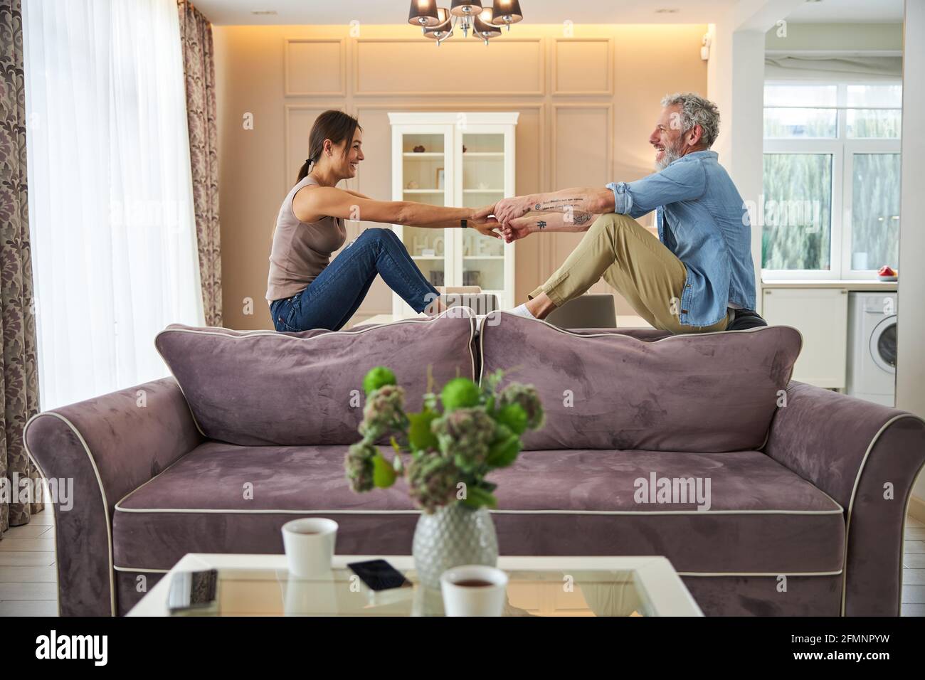 Cute female person smiling to her man Stock Photo - Alamy