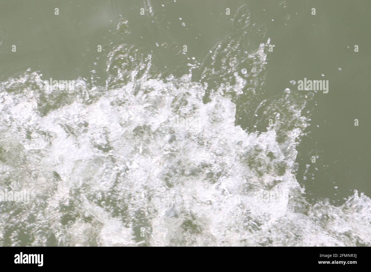 river view with water and white splash Stock Photo - Alamy