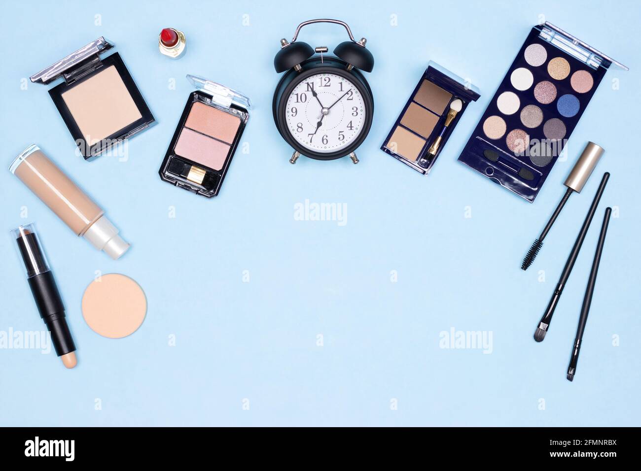 Alarm clock with essential make-up products and accessories. Quick five ...