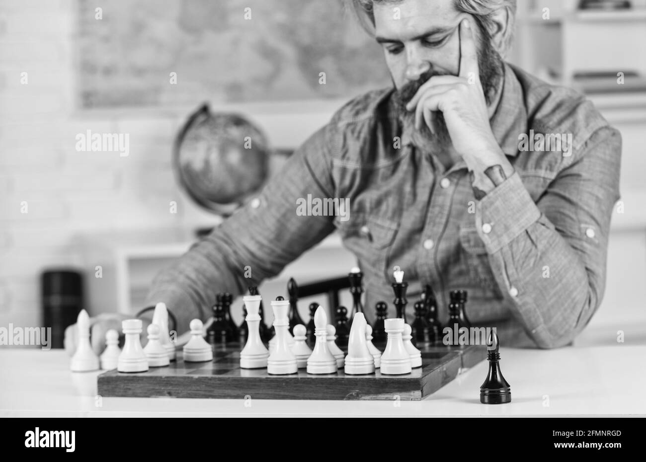 Figures on wooden chess board. Thinking about next step. Chess is ...