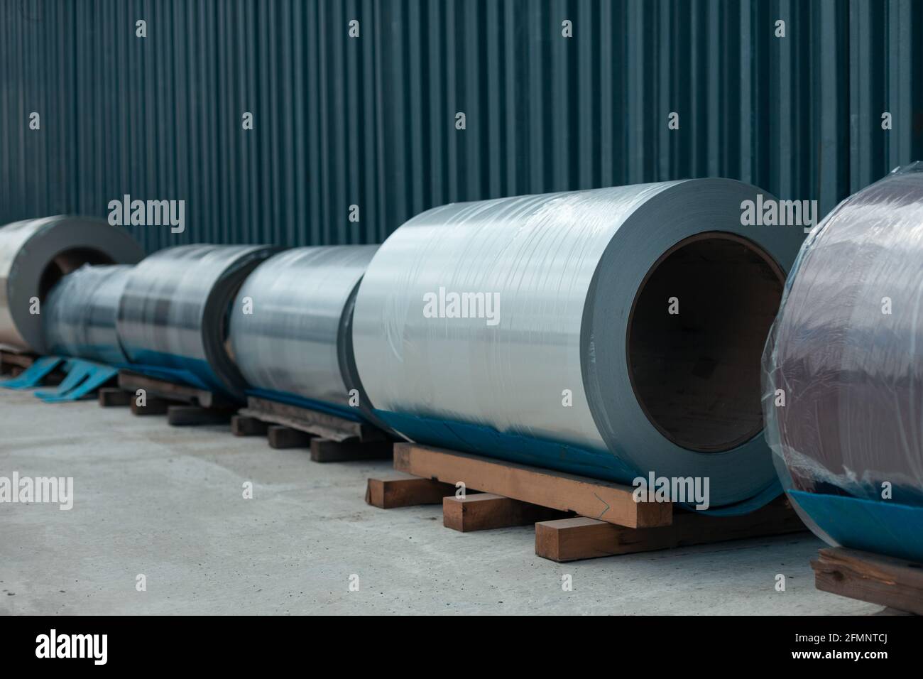 rolled metal profile at warehouse, industrial manufacture Stock Photo ...