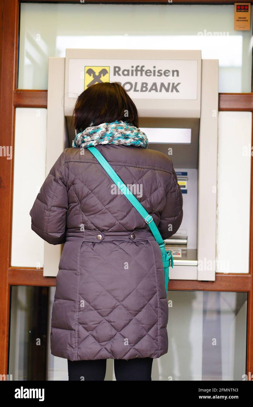 Woman raiffeisen bank atm hi-res stock photography and images - Alamy