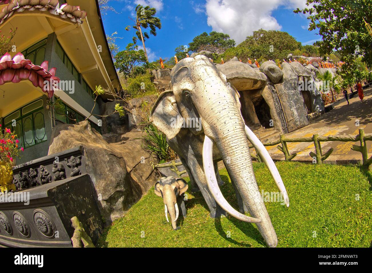 Sacred Elephants and Monks Sculptures, Golden Temple of Dambulla ...