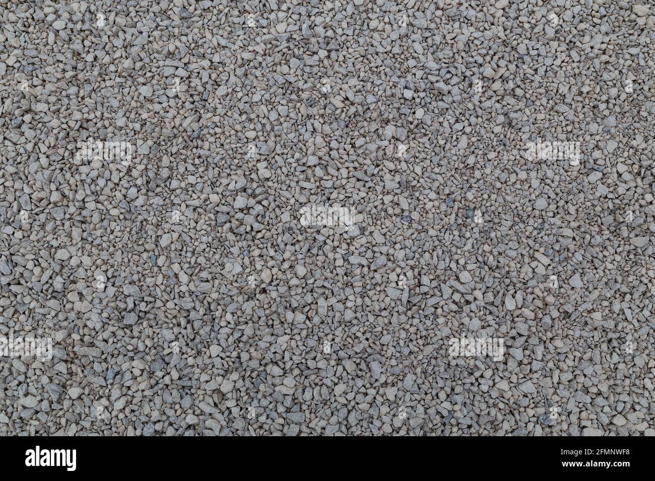 Dry white limestone ballast flat full frame background. Small gray ...