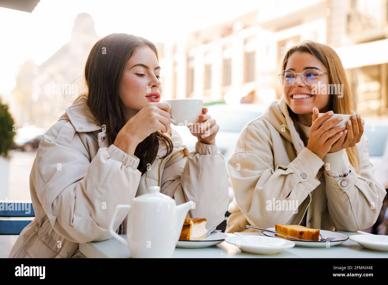Two women having tea at cafe hi-res stock photography and images - Alamy