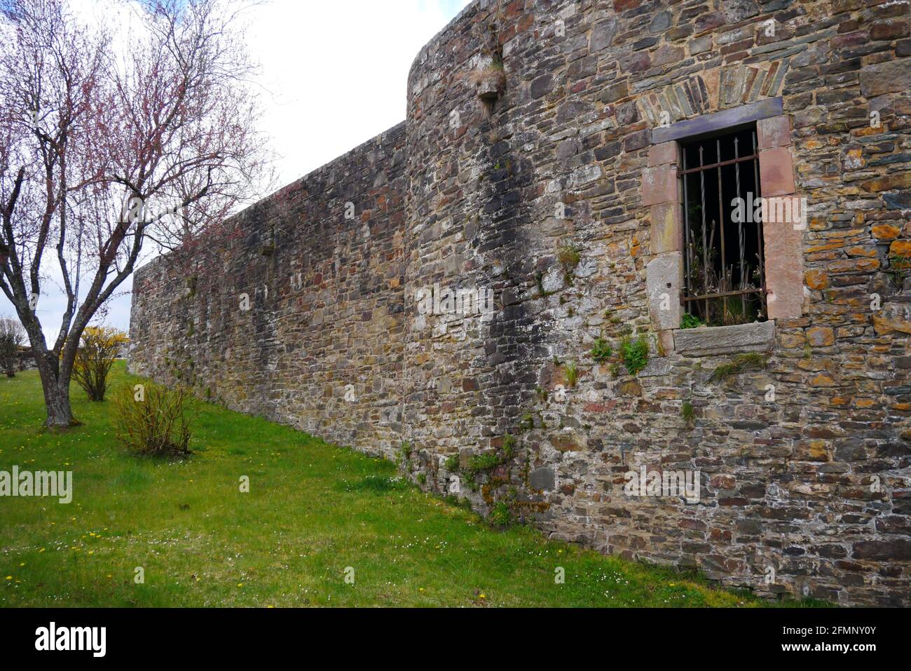 Castle wall as a defensive wall of a medieval castle with a metal ...