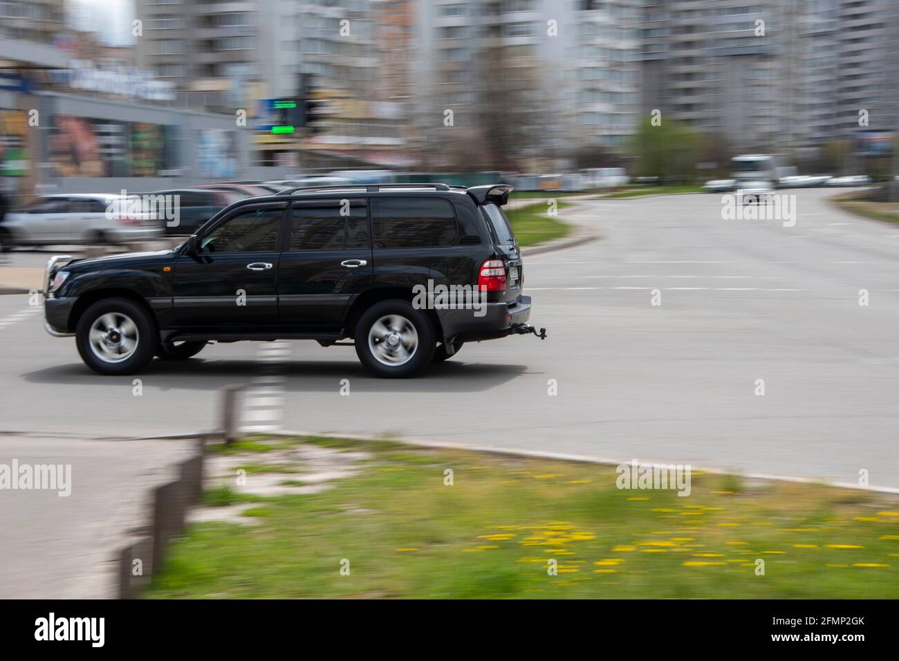 Ukraine, Kyiv - 26 April 2021: Black Toyota Land Cruiser car moving on ...