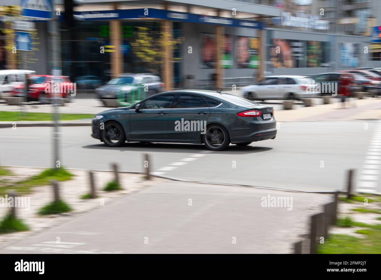 Ukraine, Kyiv - 26 April 2021: Gray Ford Mondeo car moving on the ...