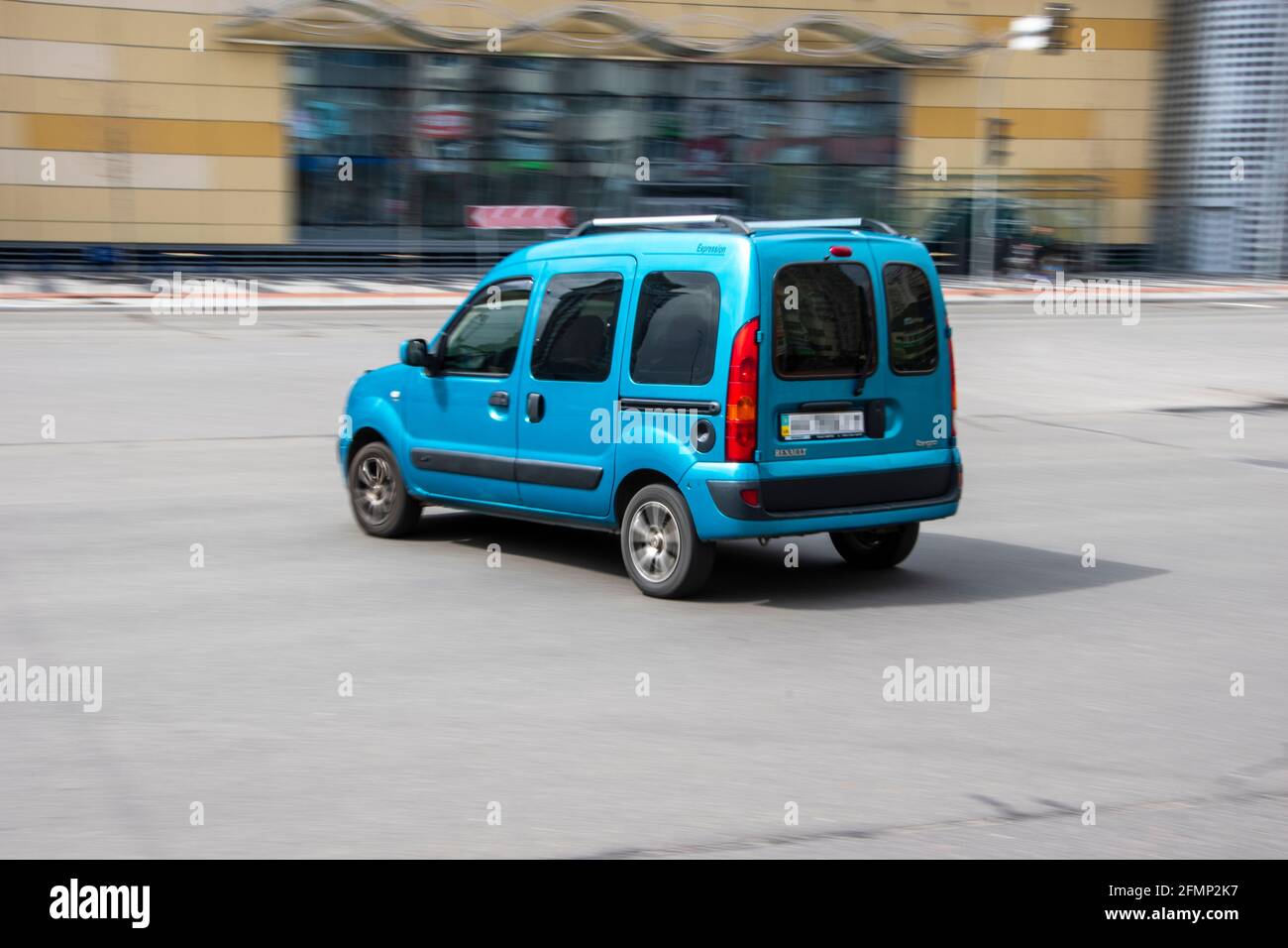Ukraine, Kyiv - 26 April 2021: Light Blue Renault Kangoo car moving on ...