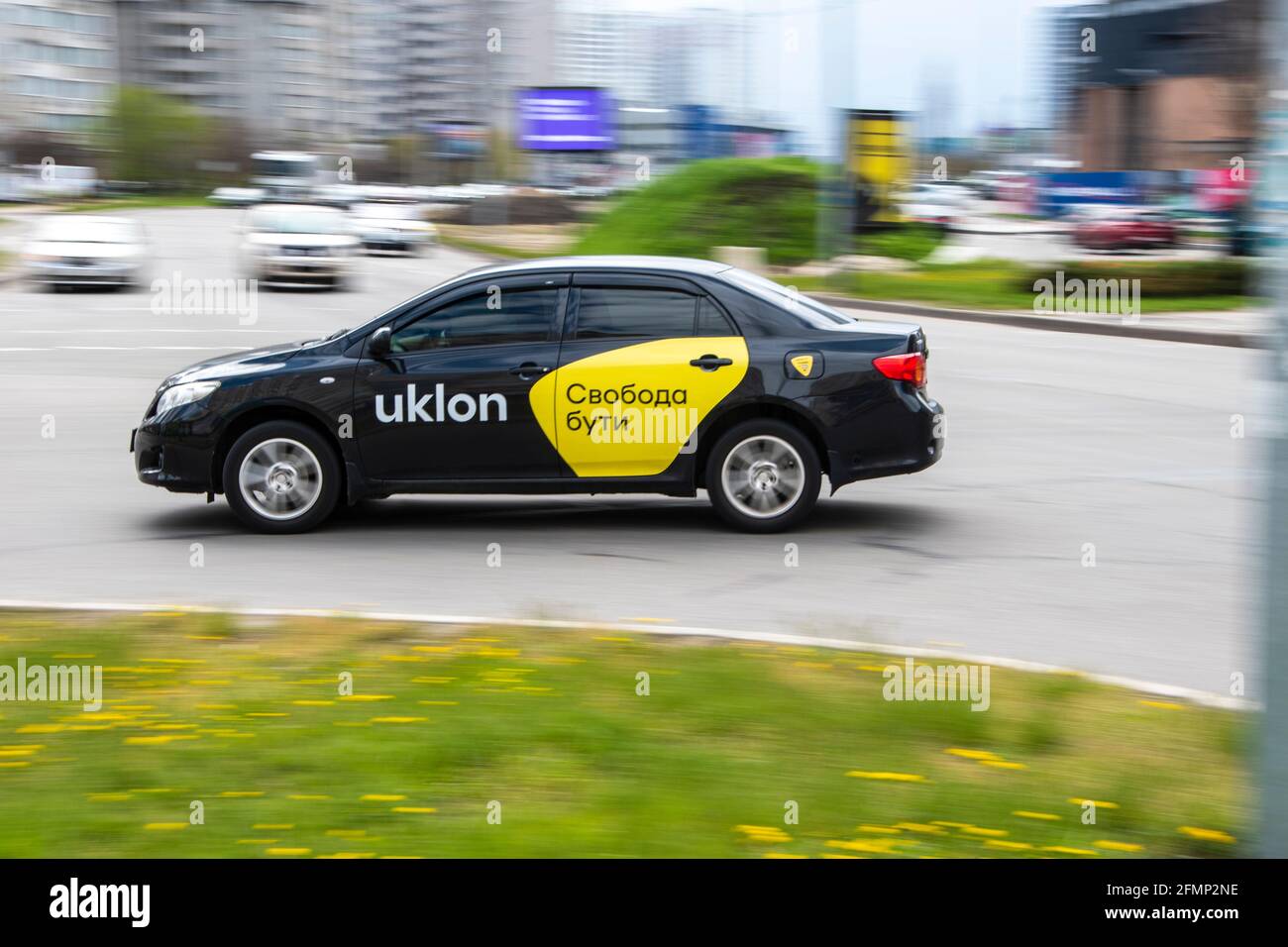Ukraine, Kyiv - 26 April 2021: Black Toyota Corolla Taxi Uklon car ...