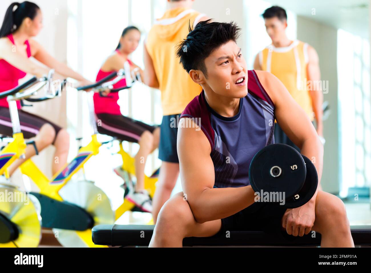 Chinese Asian group of men and woman doing sport exercise or training ...