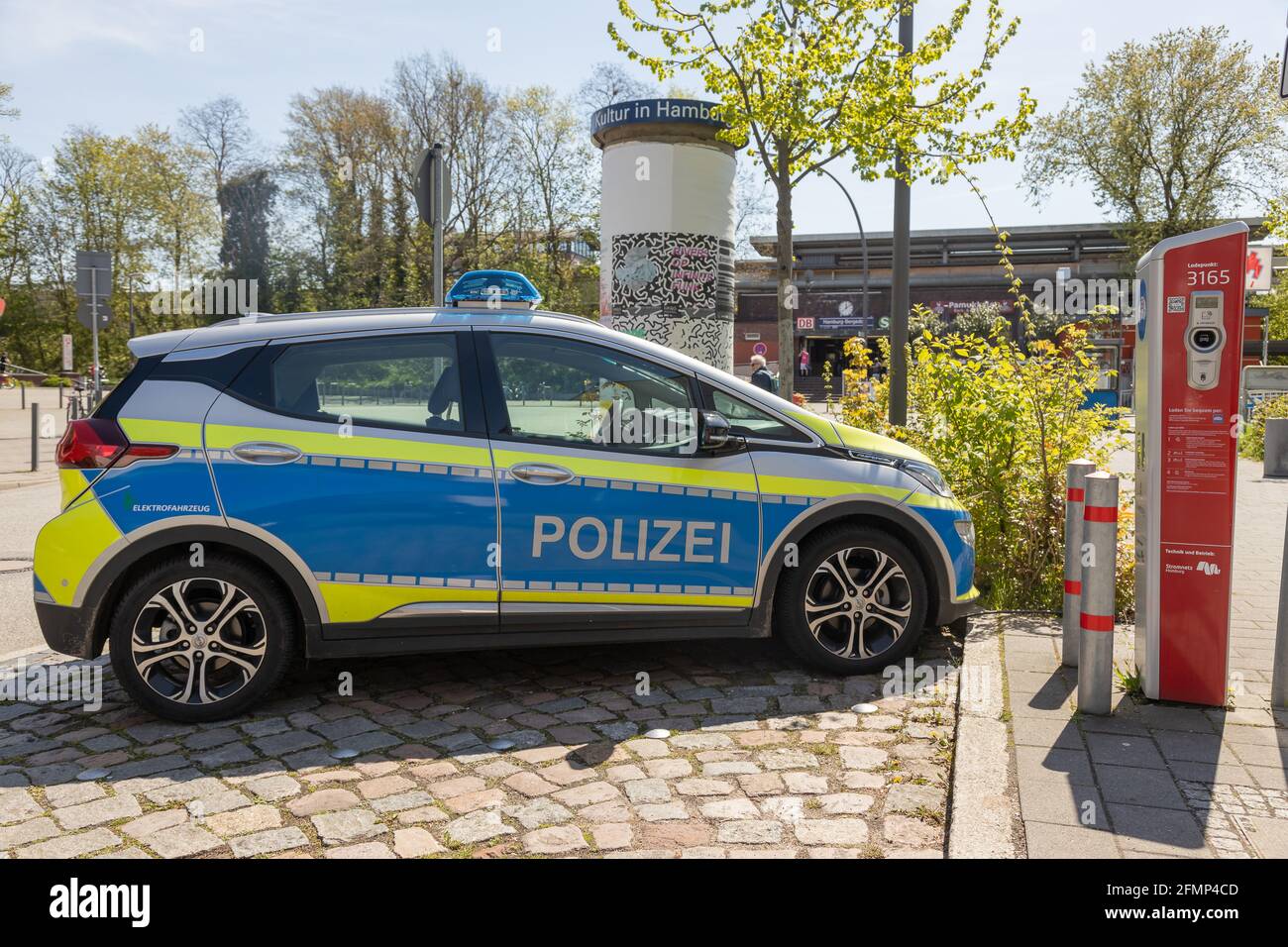 Electric Police Car At Charging Station Stock Photo - Alamy