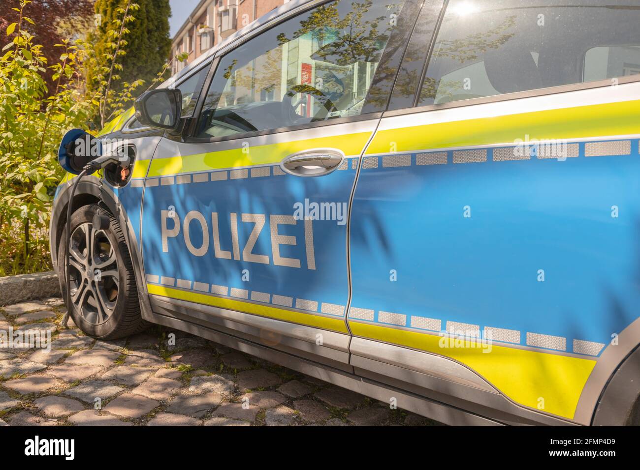 Electric Police Car Is Charging Stock Photo - Alamy