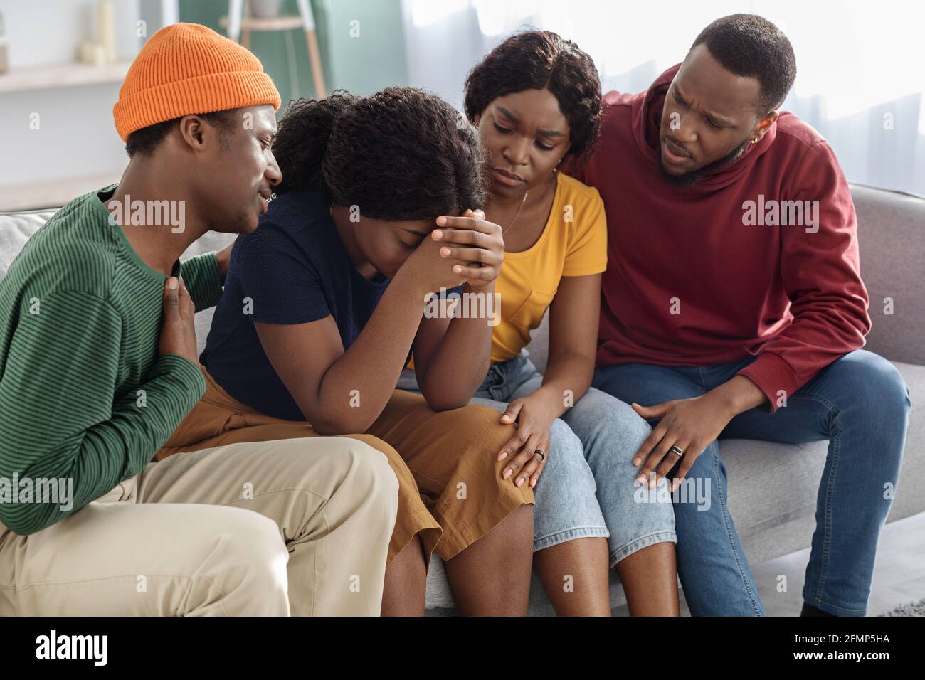 Friends comforting hi-res stock photography and images - Alamy