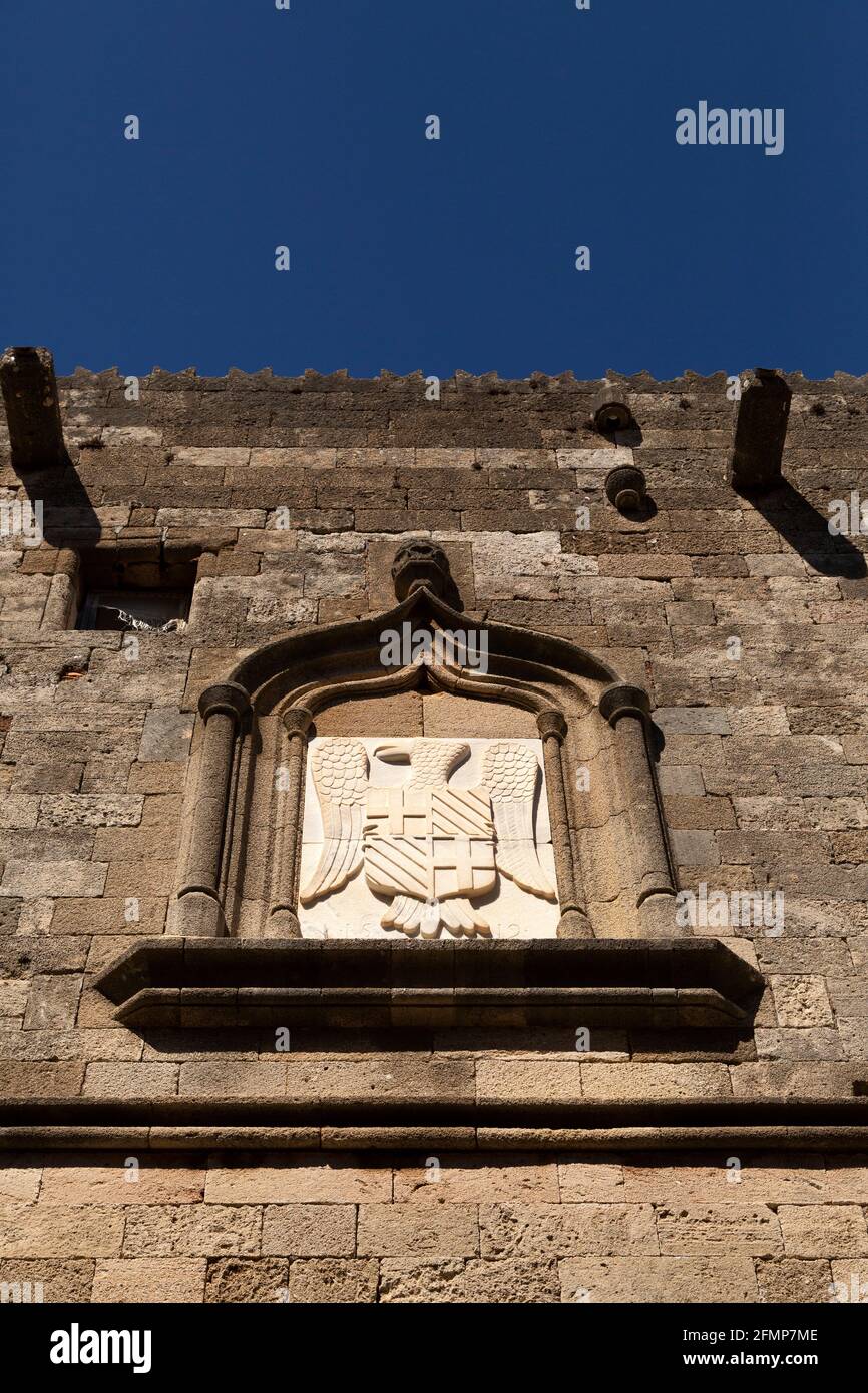 Heraldic shield depicting an eagle in Rhodes Town, Greece. Rhodes has ...