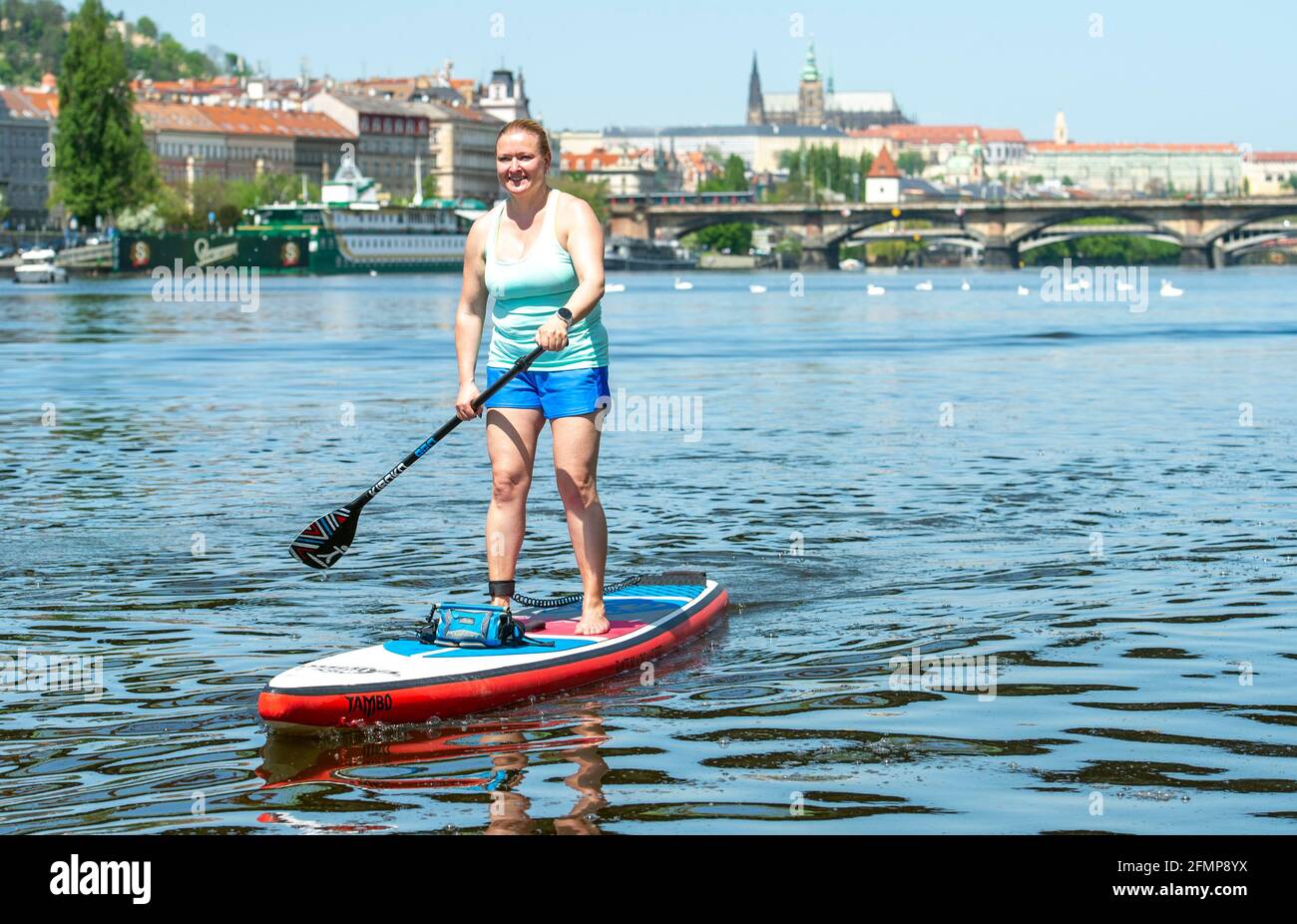 Prague, Czech Republic. 11th May, 2021. Women ride a stand-up ...