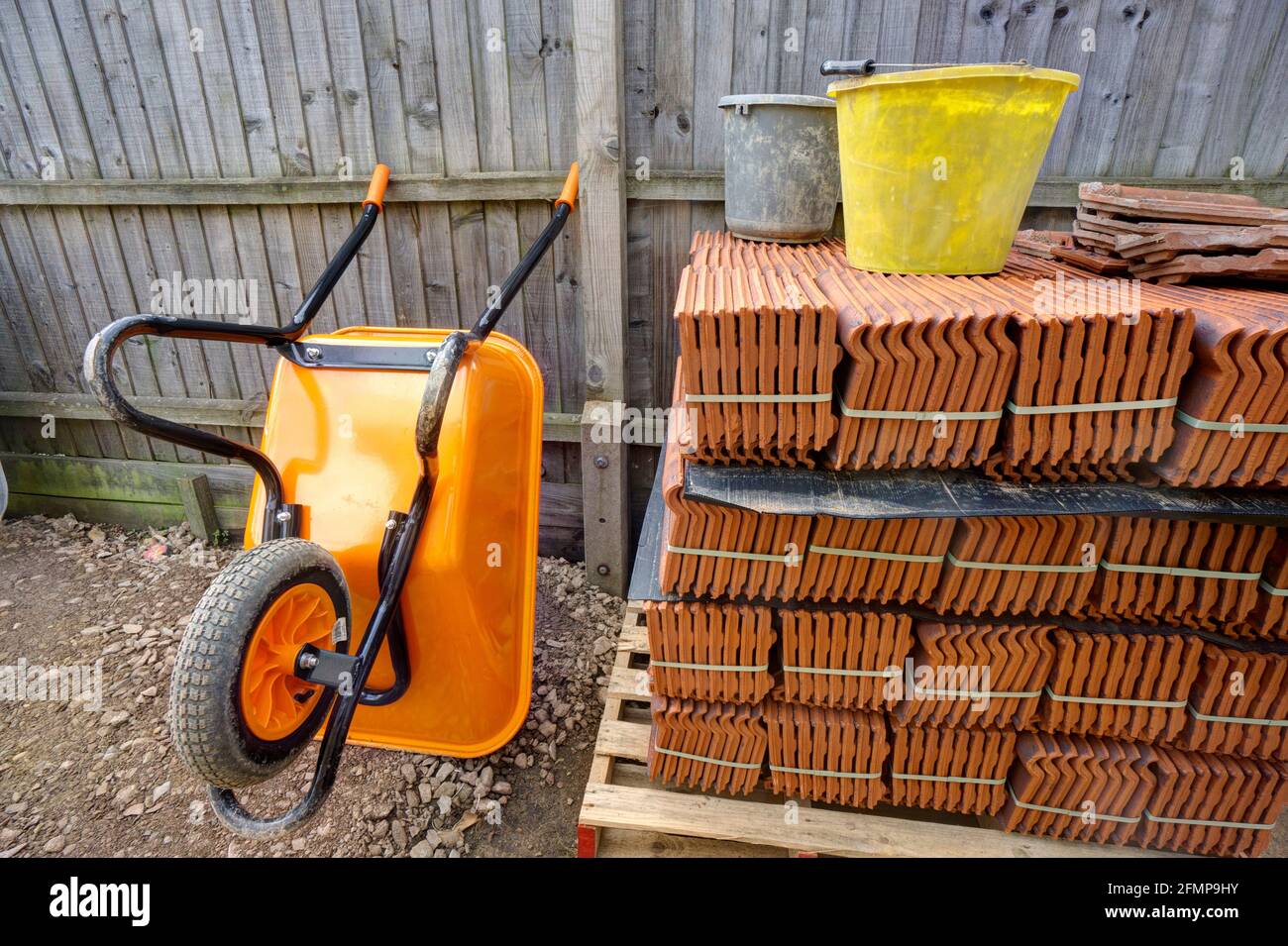Wooden wheel barrow hi-res stock photography and images - Alamy