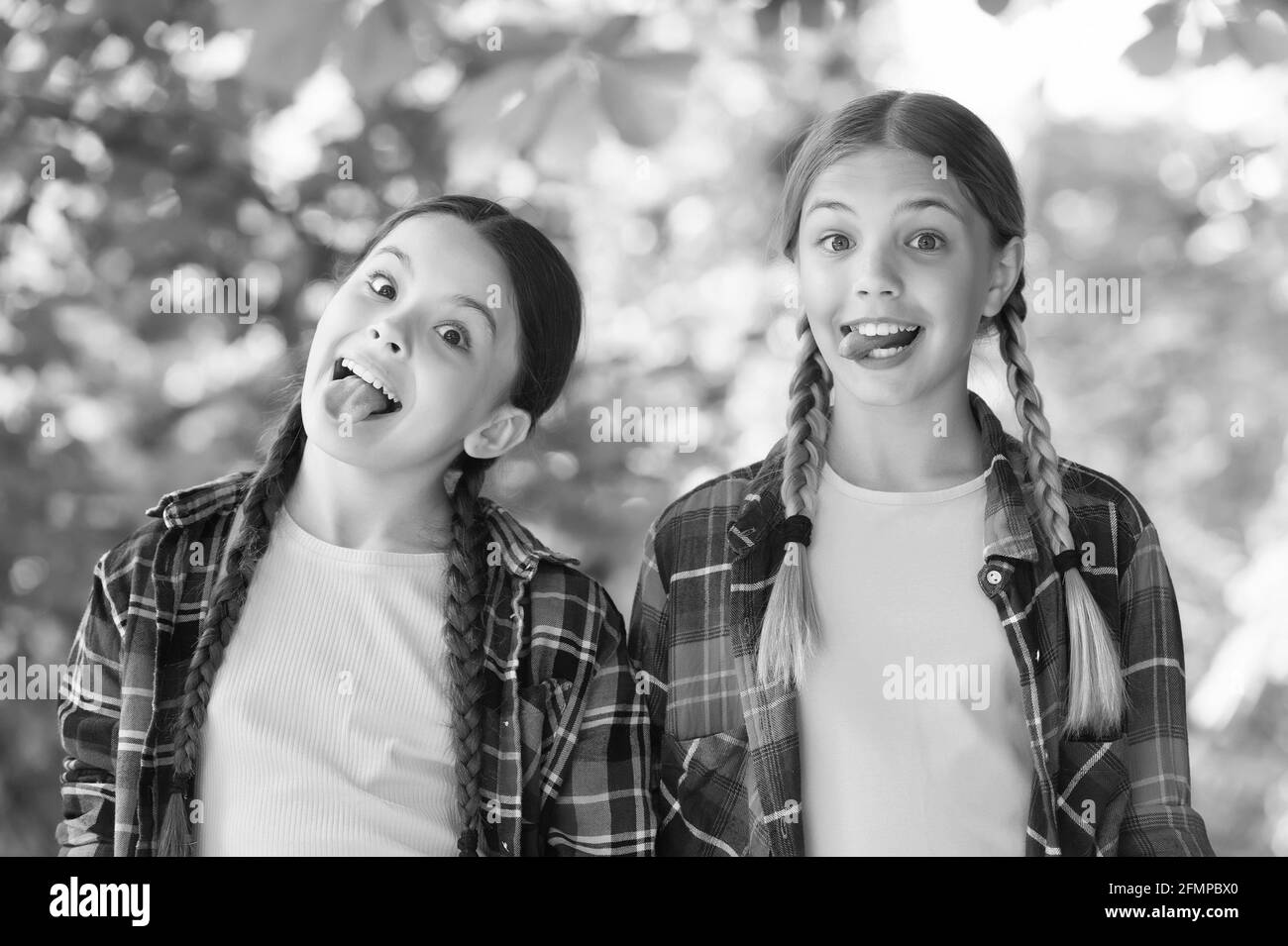 day full of fun. carefree kids posing outdoor. Positive models. Casual ...