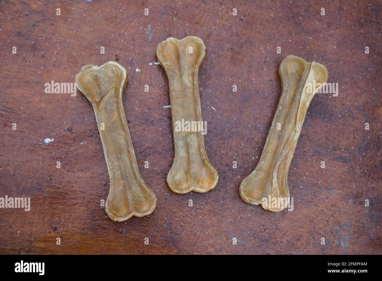 Fake bones on a rusty background Stock Photo - Alamy