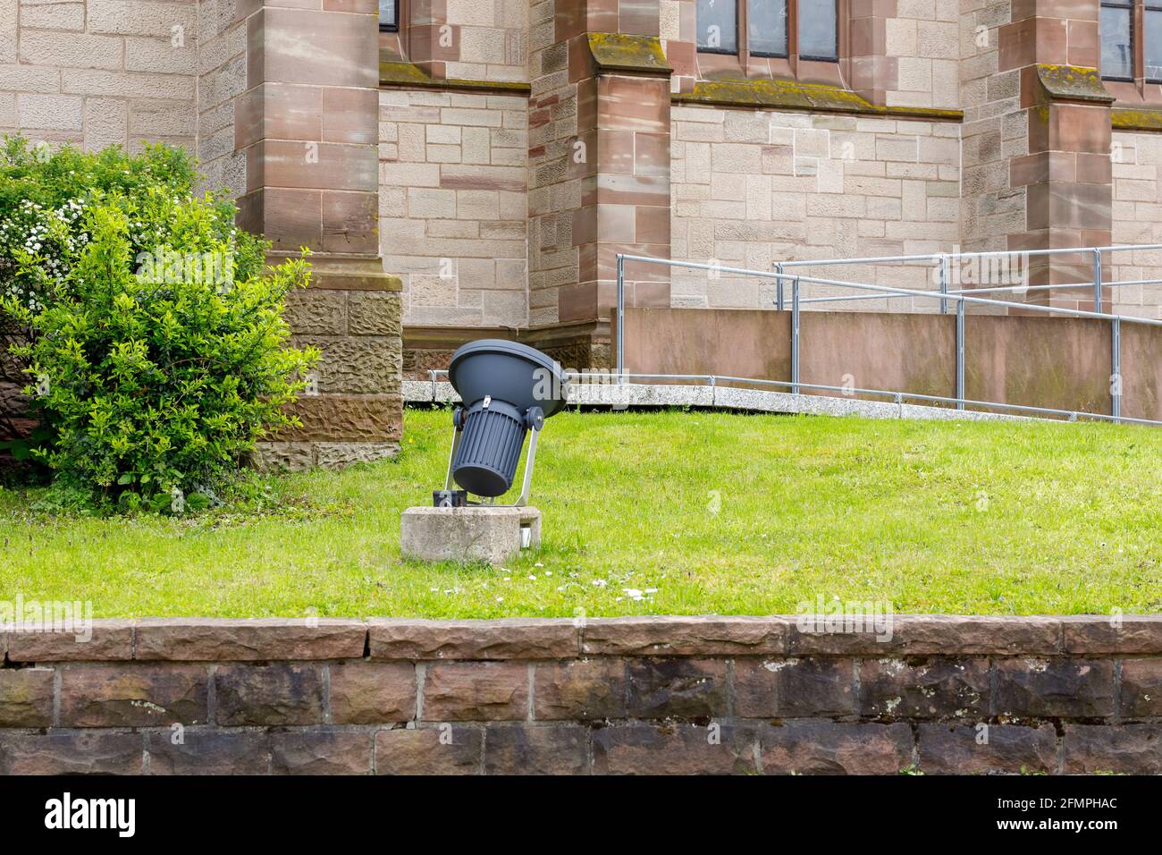 Halogen spotlights in front of a building Stock Photo - Alamy