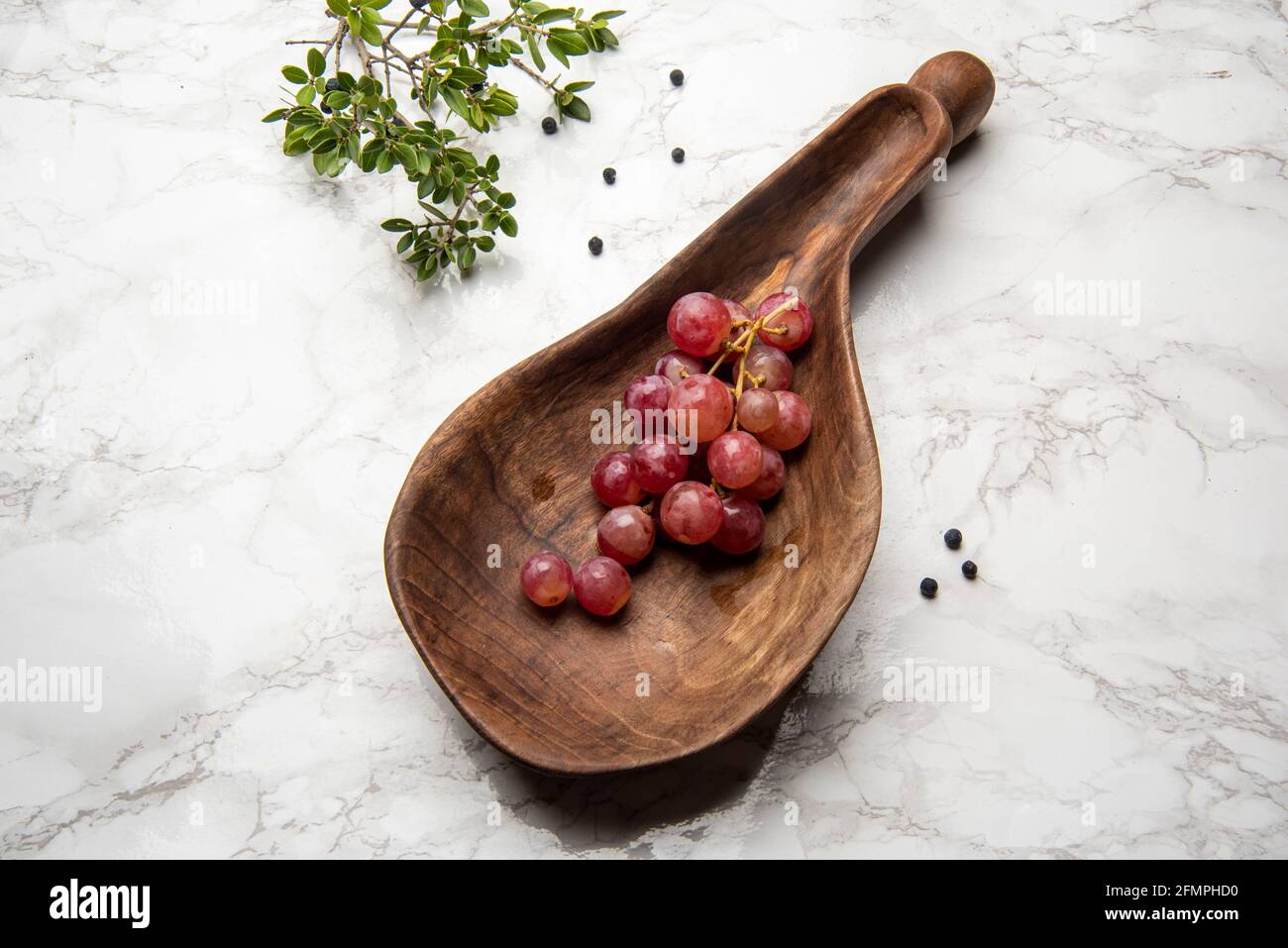little grapes with wooden bowl Stock Photo - Alamy