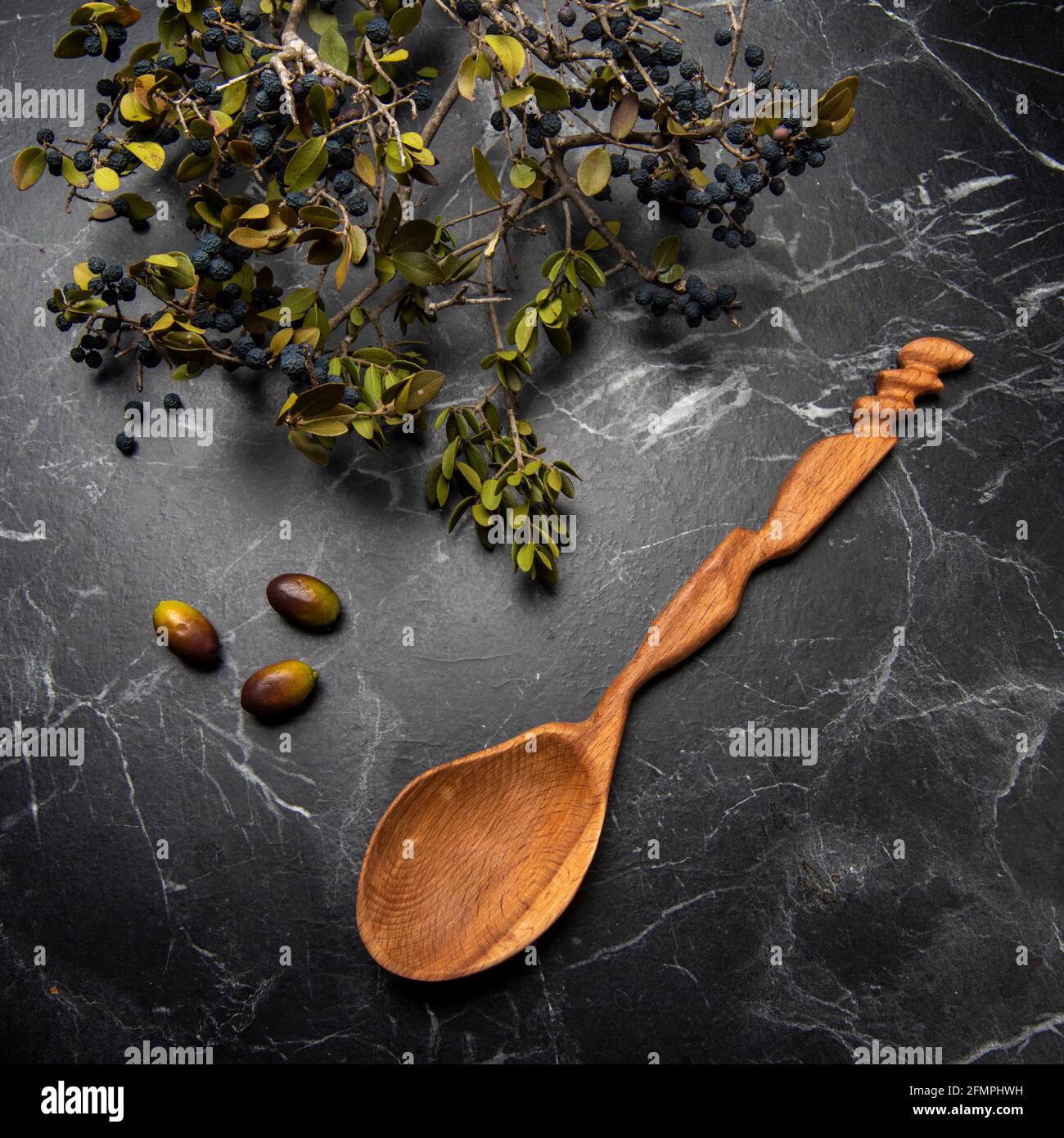 hand carved kitchen tools in the kitchen Stock Photo - Alamy
