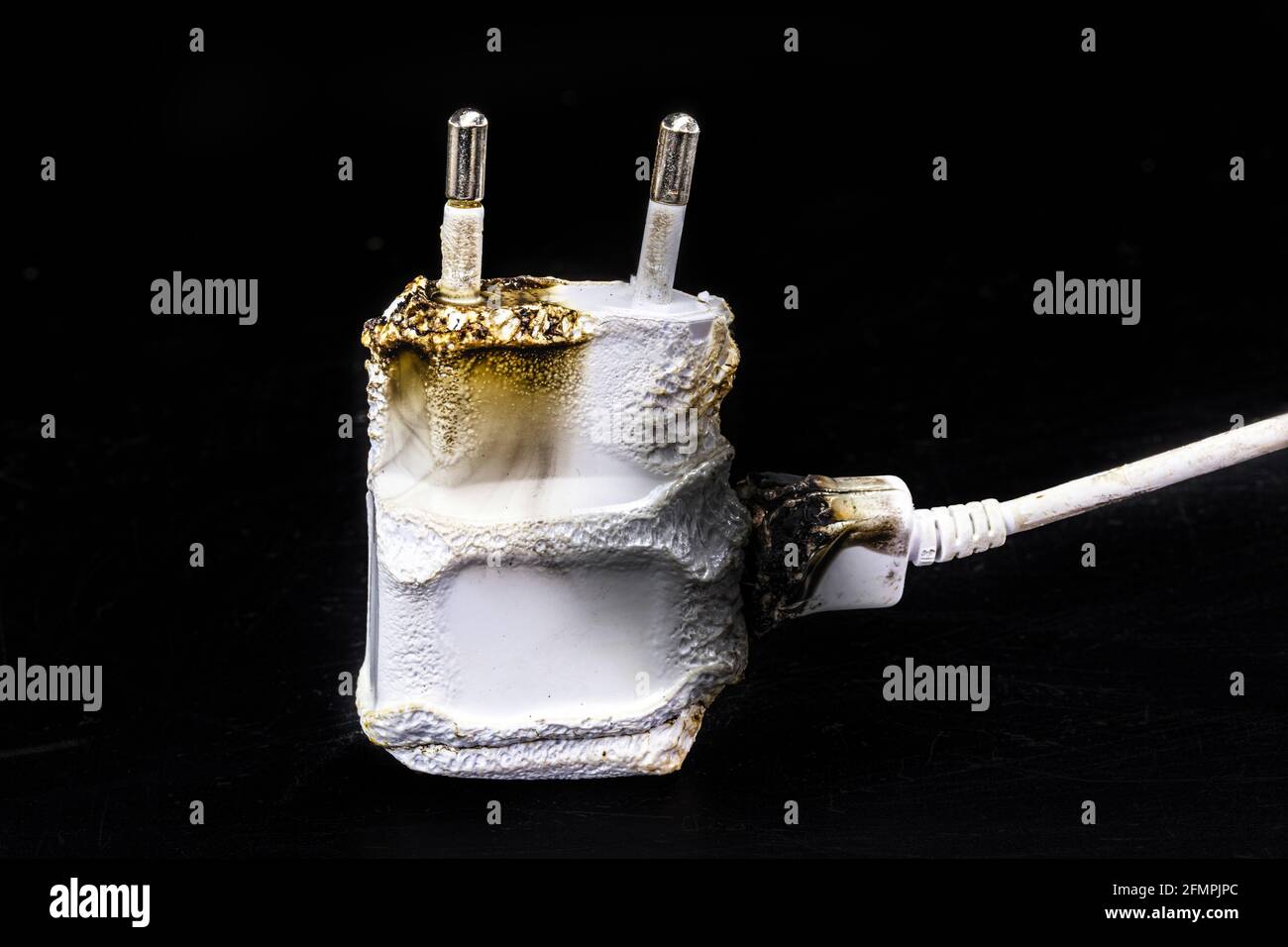 broken smartphone charger, charred after short circuit Stock Photo - Alamy