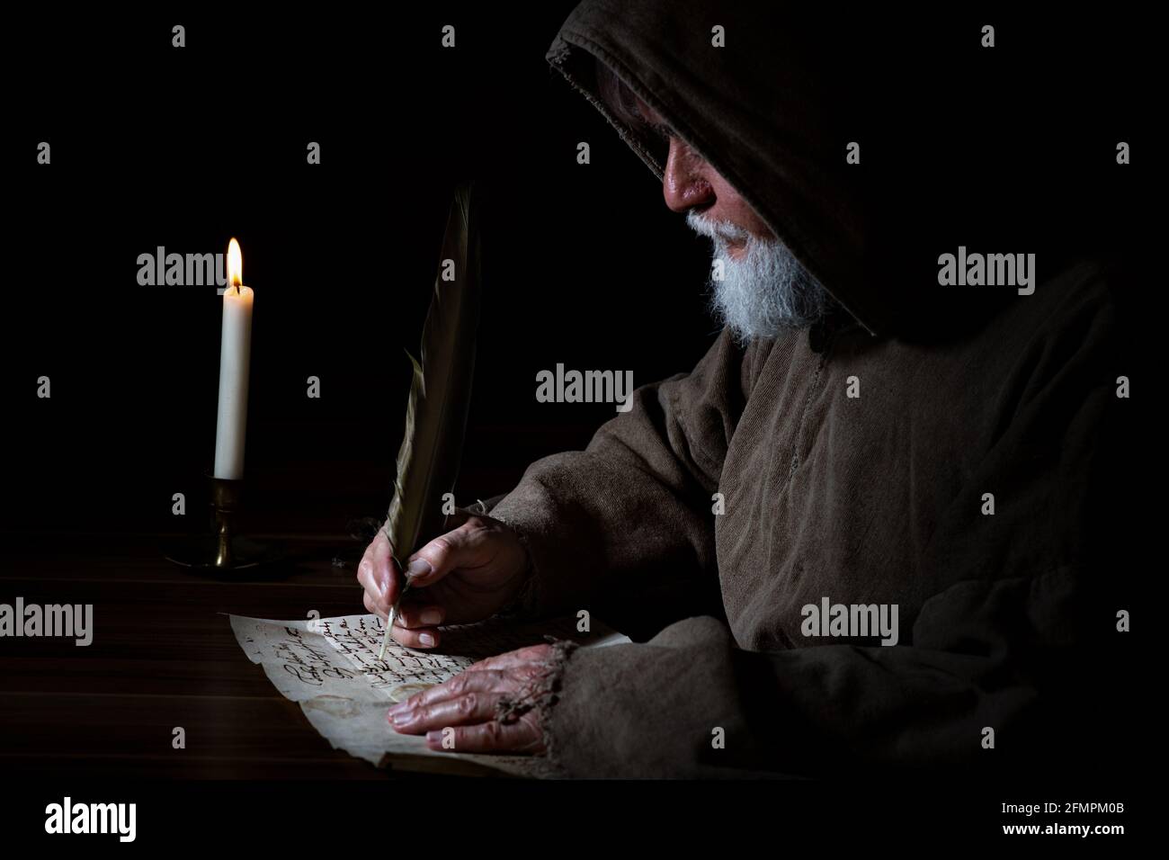Medieval monk writing hi-res stock photography and images - Alamy