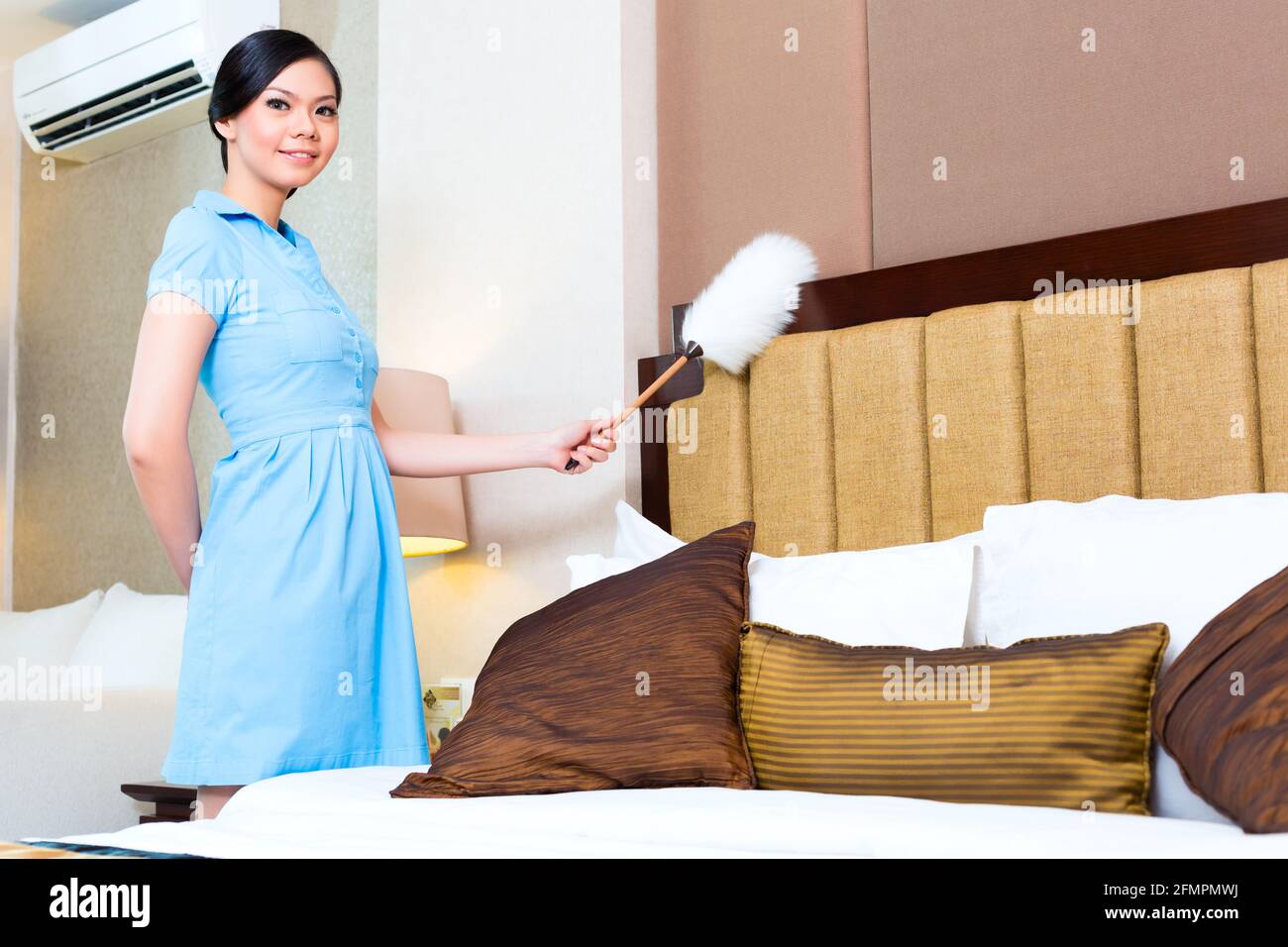 Asian hotel maid hi-res stock photography and images - Alamy