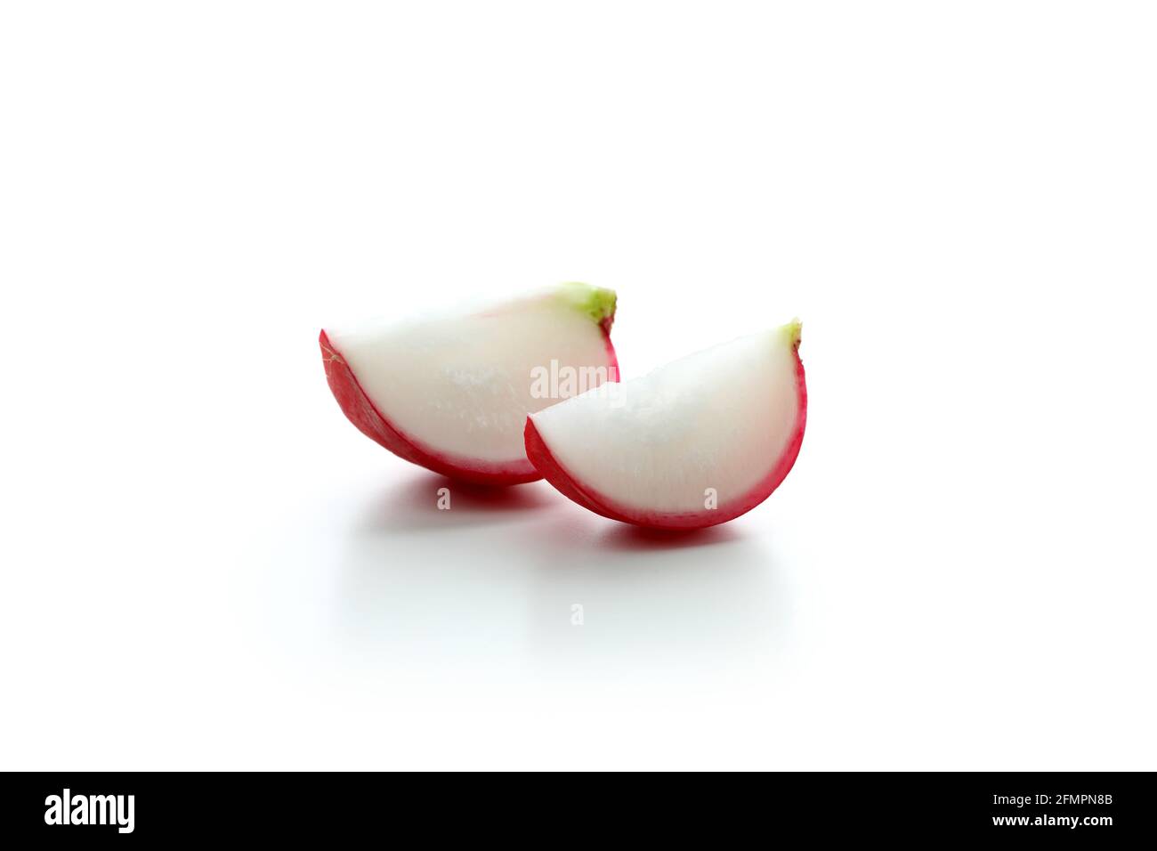 Fresh radish slices isolated on white background Stock Photo - Alamy
