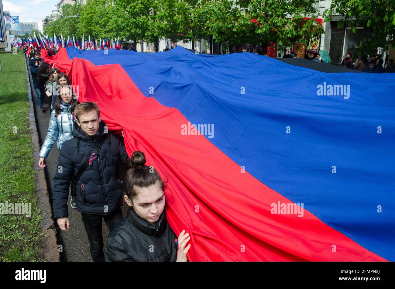 May 11, 2021. Donetsk region, Ukraine. Local residents carry the ...