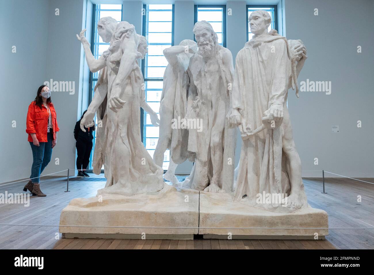 London, UK. 11 May 2021. Staff members pose with the original plaster ...