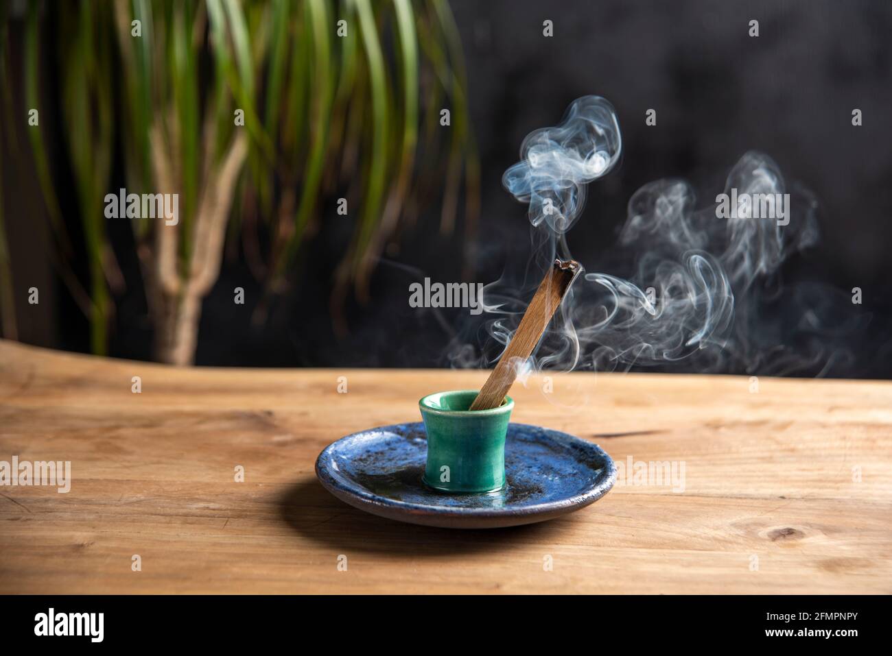 incense is burning with smoke in a room Stock Photo - Alamy