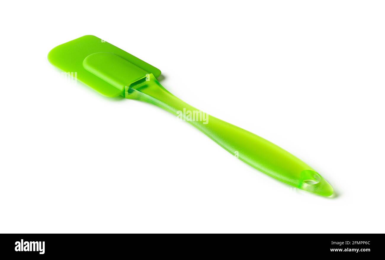 Side view of green silicone spatula isolated on white backgrounds. New ...