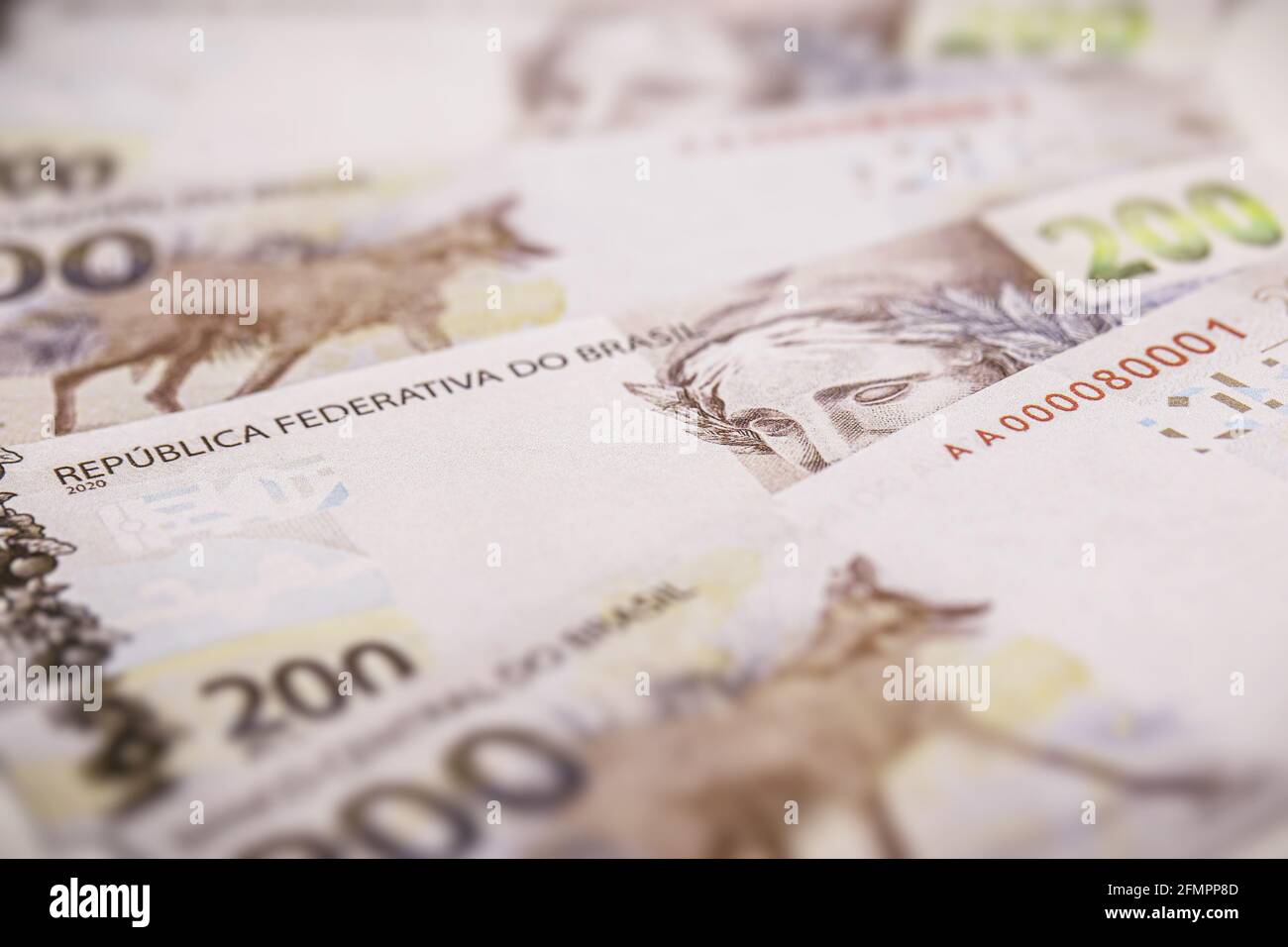 currency of one real with notes of 200 reais. Banknote of two hundred ...