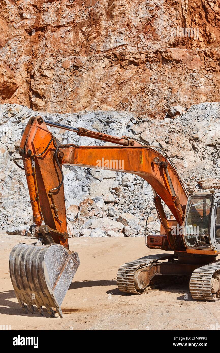 Heavy excavator on a quarry. Excavation machinery. Earthmover Stock ...