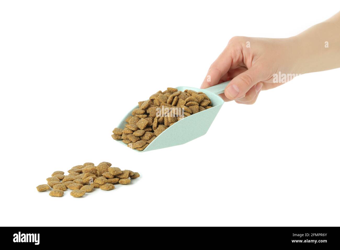 Female hand hold scoop with animal feed, isolated on white background ...