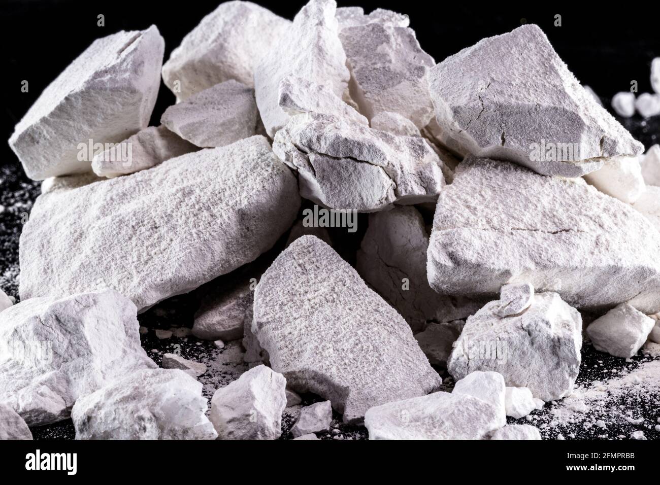 Calcium and Magnesium stones, black background. Called virgin lime or ...