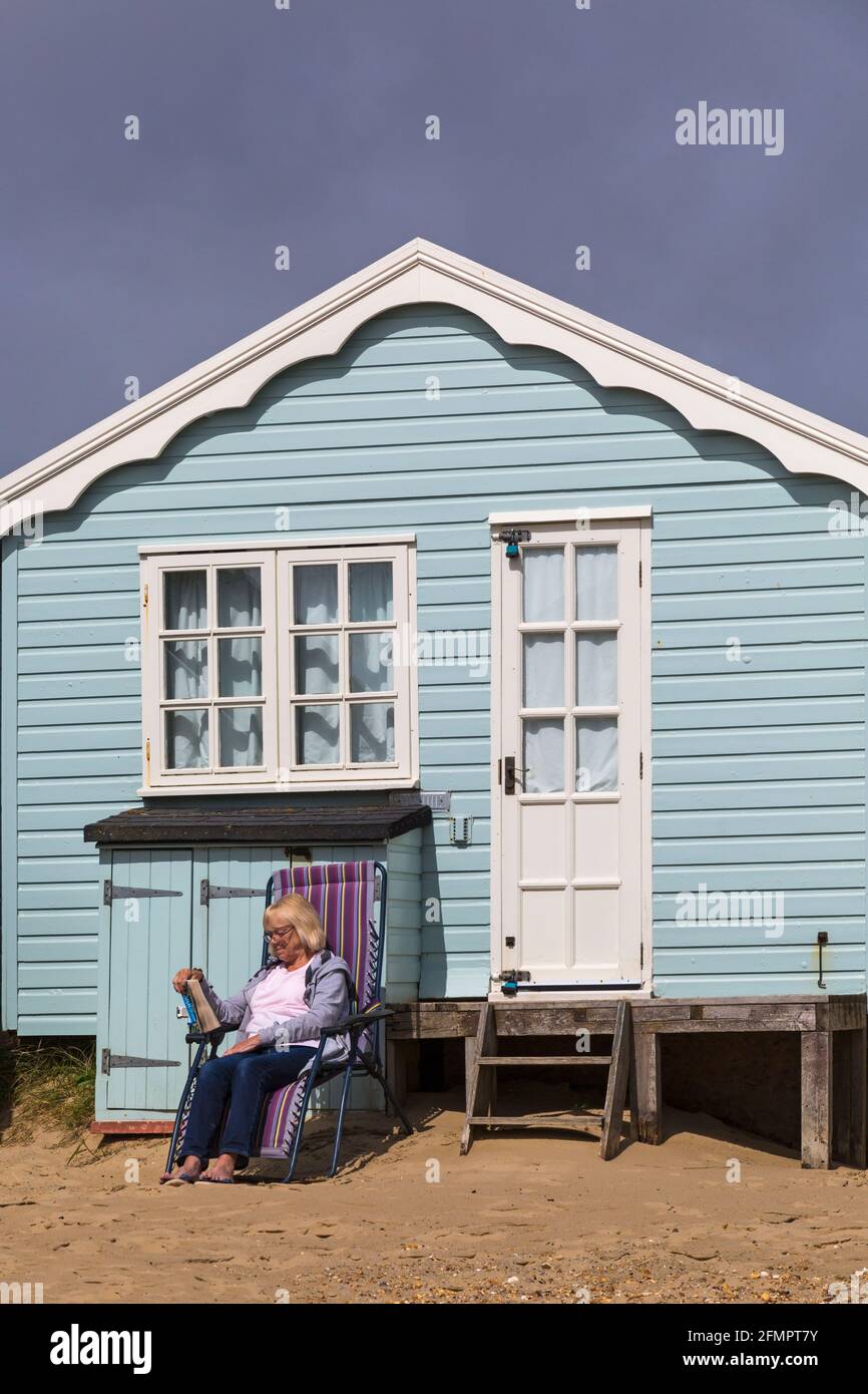 Lady relaxing in a beach hut hi-res stock photography and images - Alamy