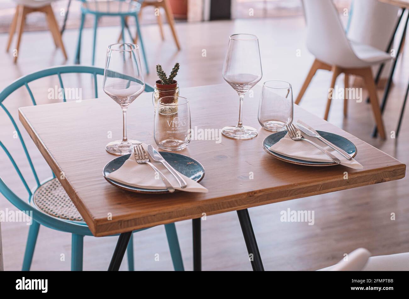 Dining table arranged and prepared for celebration Stock Photo - Alamy