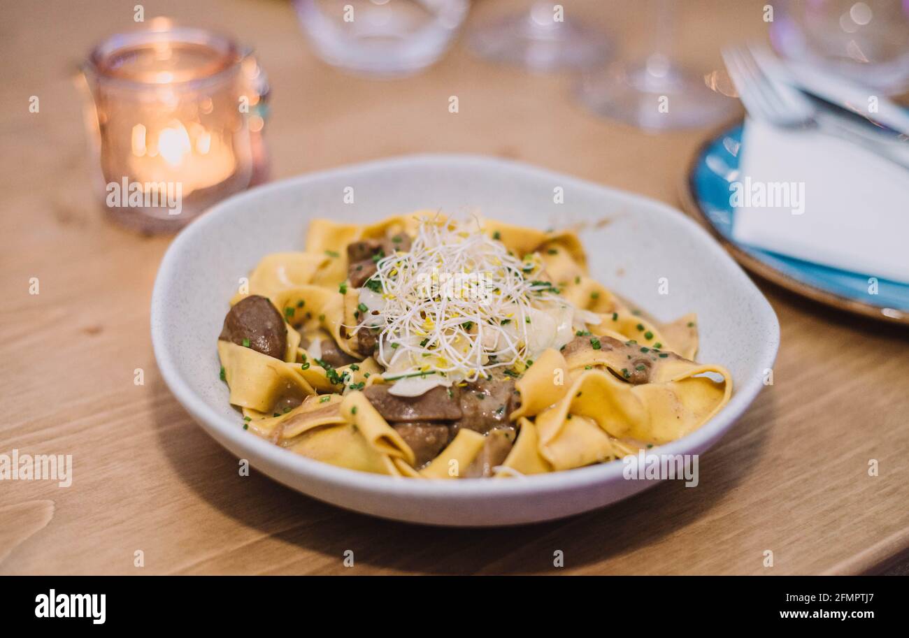 Italian fresh pasta dish of tagliatelle with mushrooms Stock Photo - Alamy