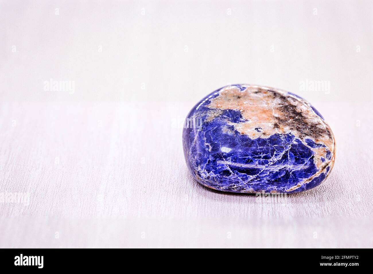 rare mineral usually blue or bluish-violet in color, a stone used in ...