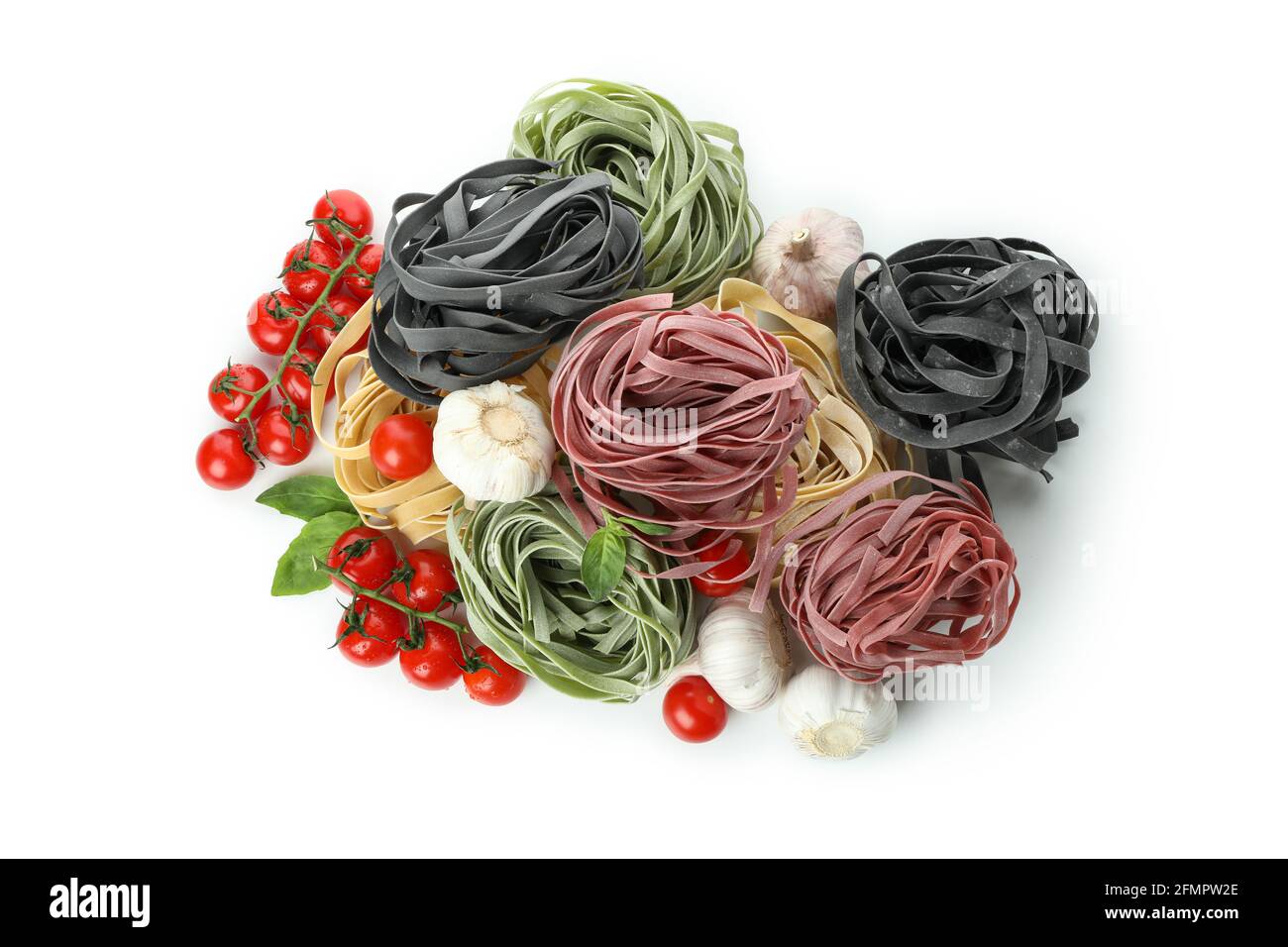 Uncooked color pasta isolated on white background Stock Photo - Alamy
