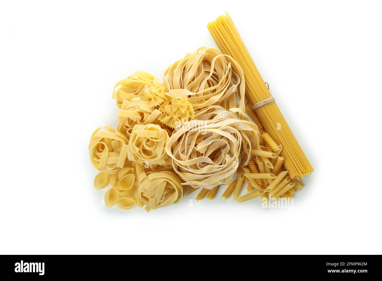 Uncooked raw pasta isolated on white background Stock Photo - Alamy