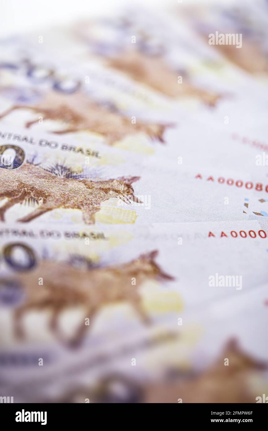 currency of one real with notes of 200 reais. Banknote of two hundred ...