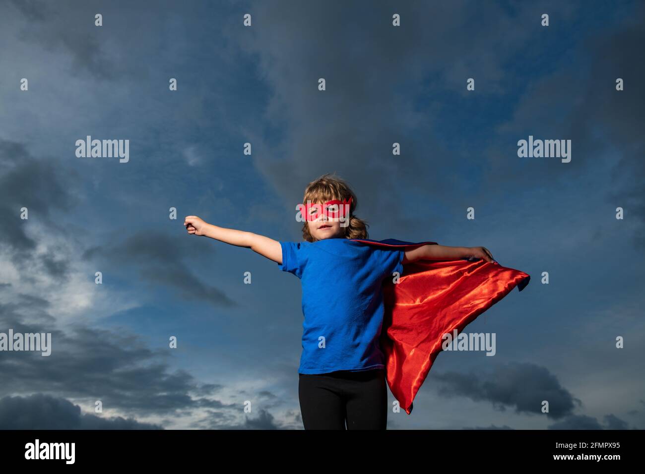 Little child superhero with hero cloak. Success, motivation concept ...