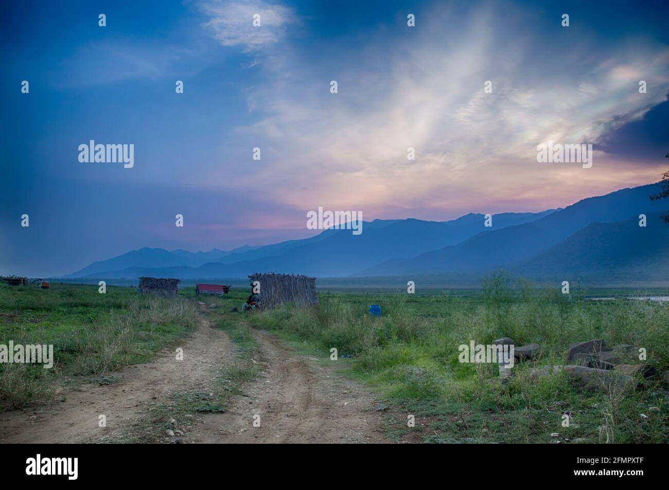 Sunset view in village Stock Photo - Alamy