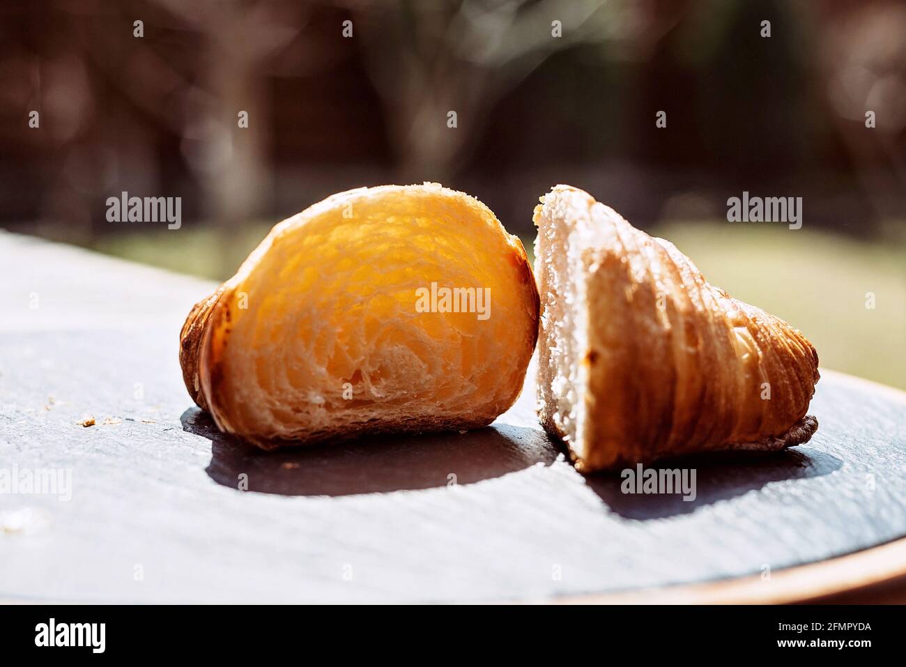 Fresh baked croissants in a cut. Warm aromatic buttery croissants ...